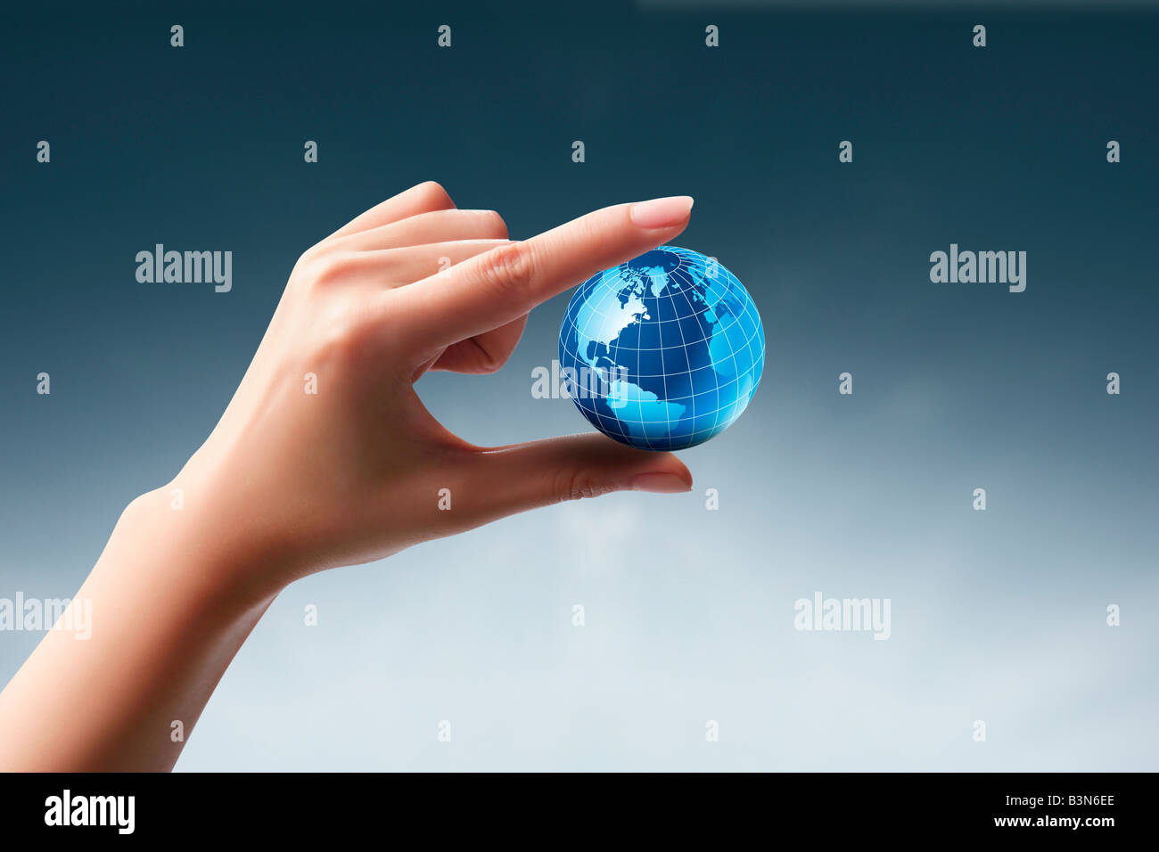 globe in hand,concept Stock Photo - Alamy