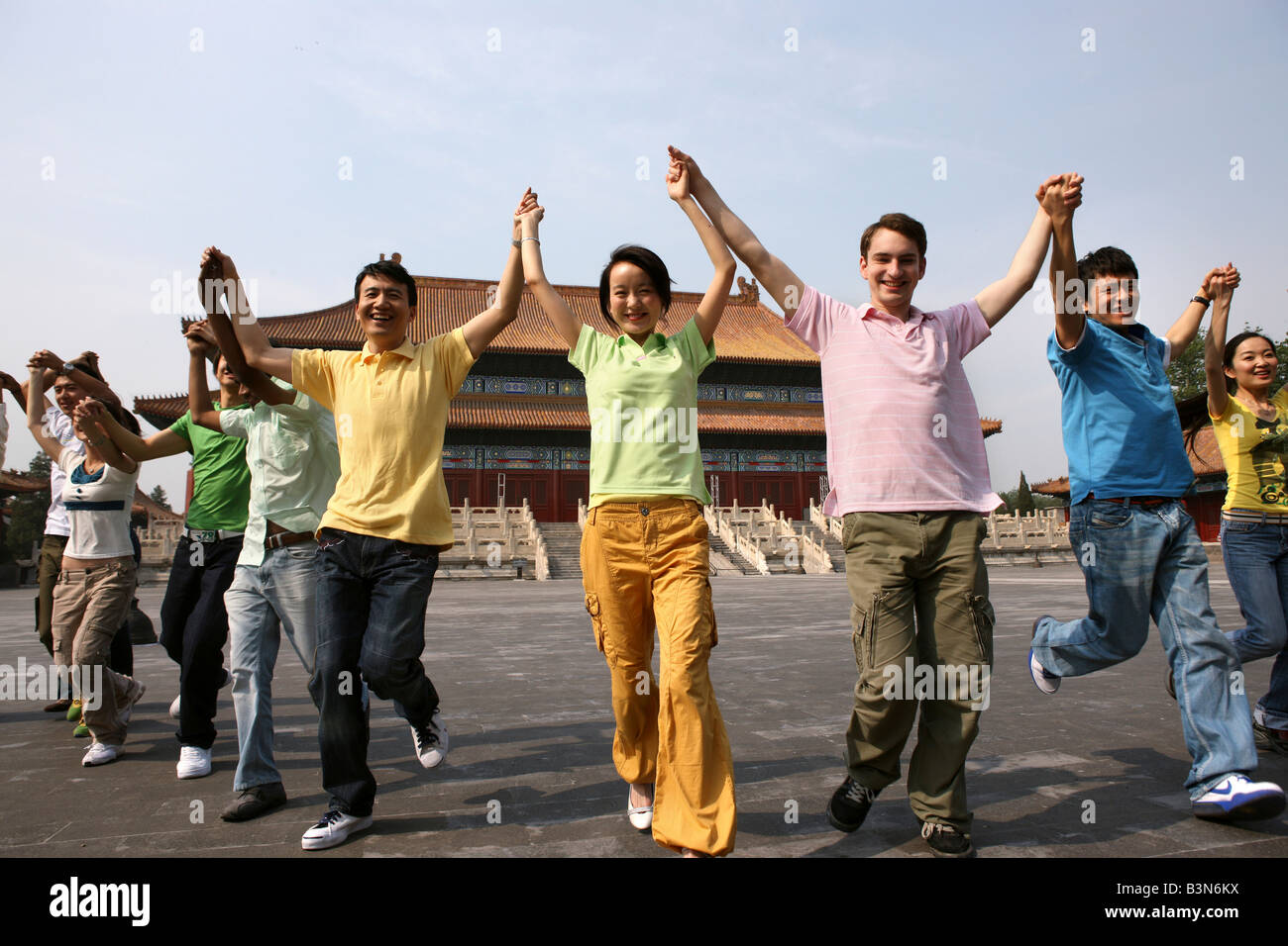 people from different countries being together in the Forbidden city ...