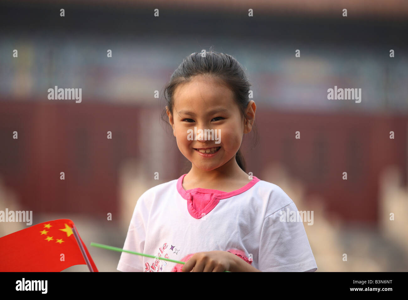Child holding chinese national flag hi-res stock photography and images ...