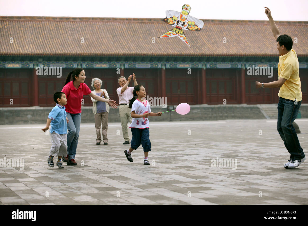 chinese families flying kites in the forbidden city,beijing,china Stock ...