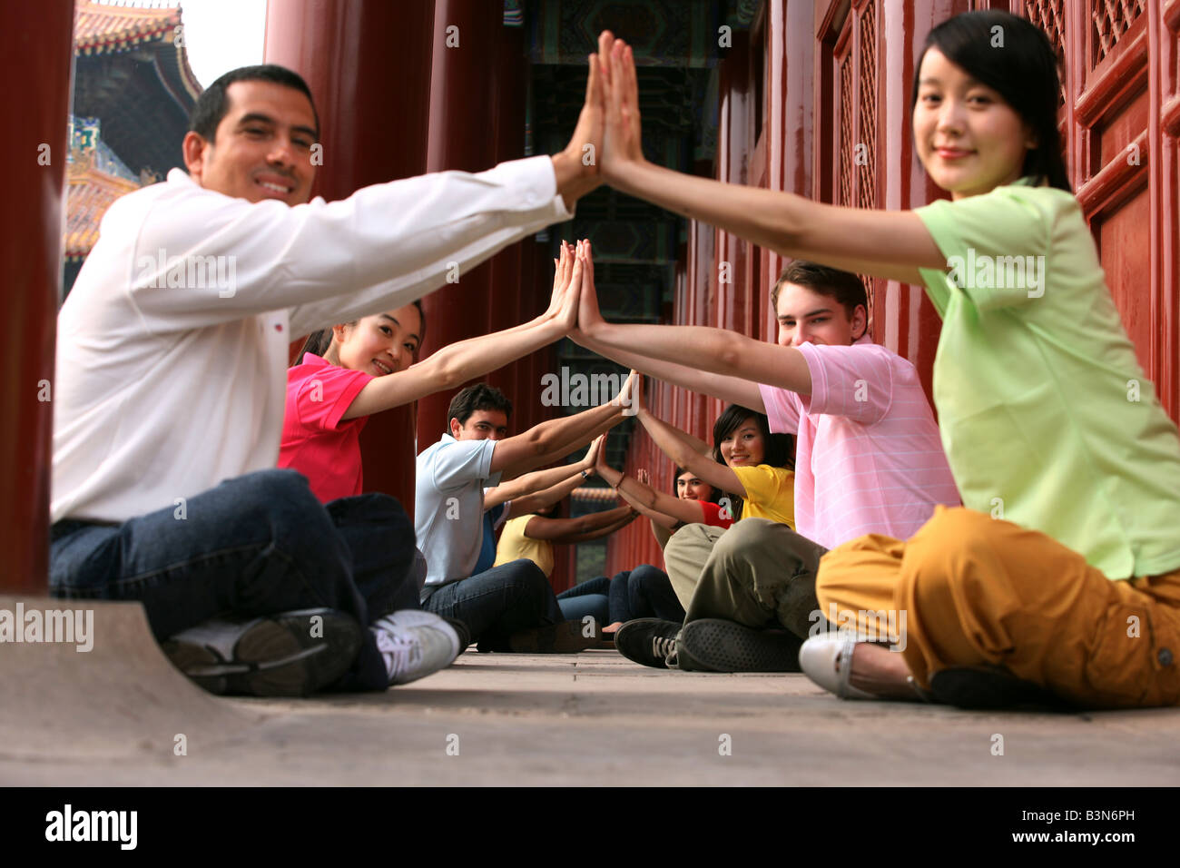 people from different countries being together in the Forbidden city ...