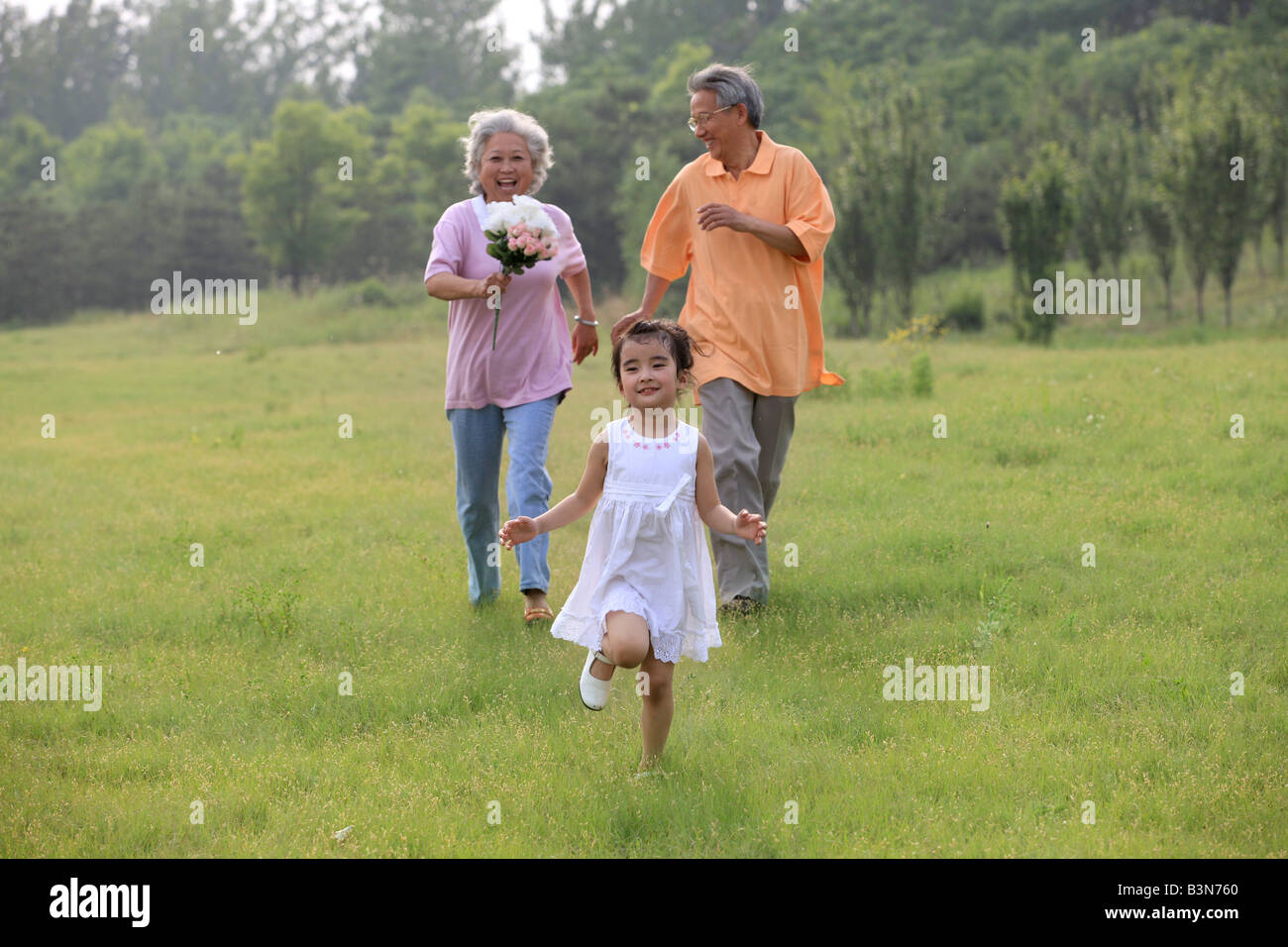 chinese family picnicing outdoors,beijing Stock Photo - Alamy