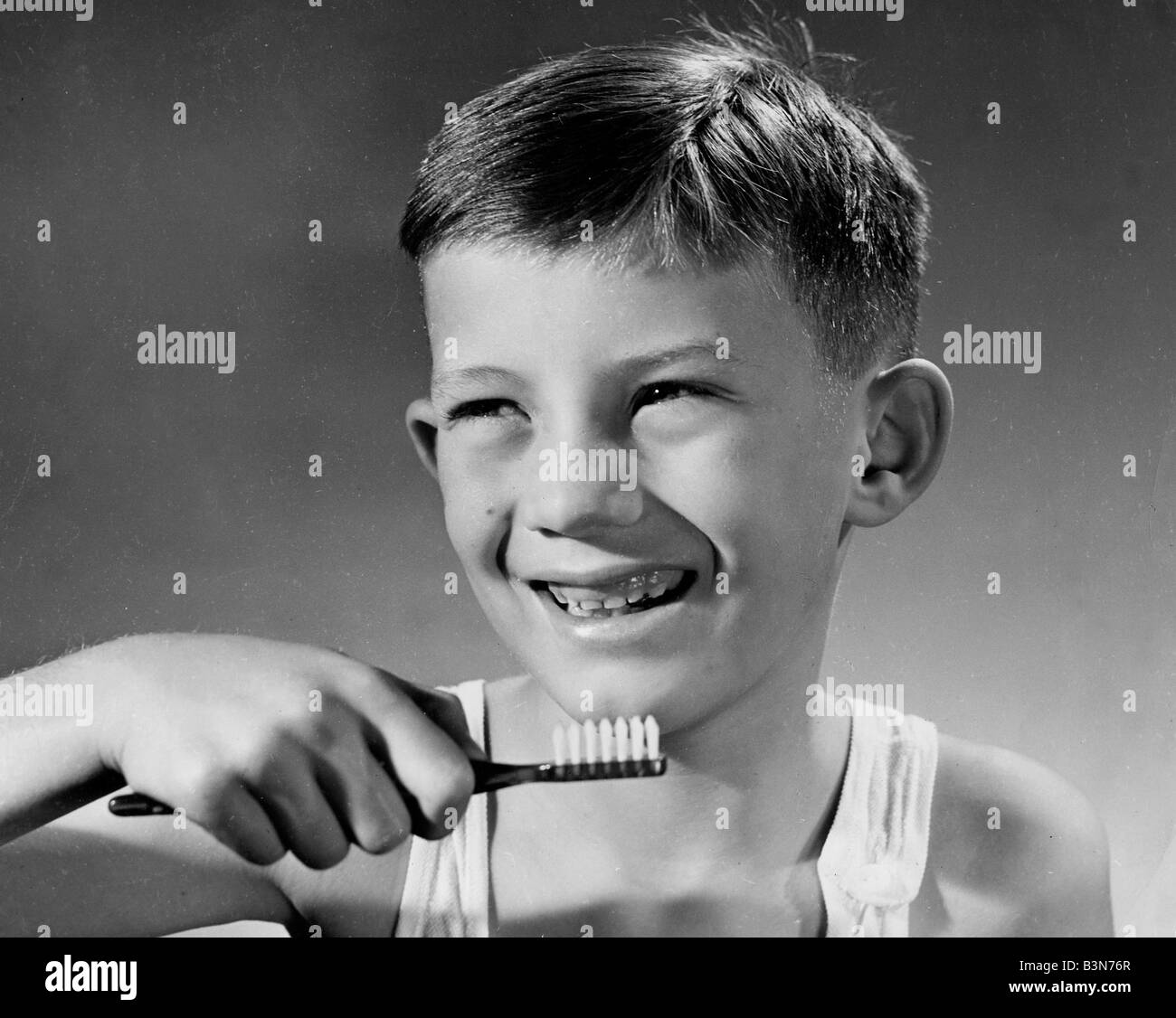 BOY TEETH BRUSHING Stock Photo - Alamy