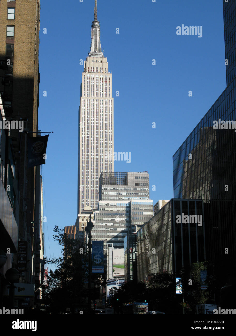 Empire State building as seen from street level in New York City Stock ...