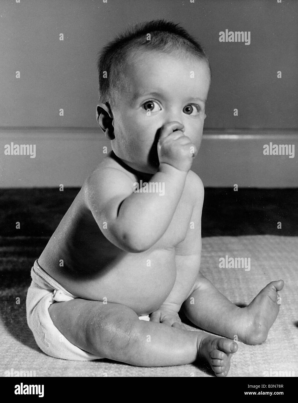 Baby sucking thumb Black and White Stock Photos & Images - Alamy