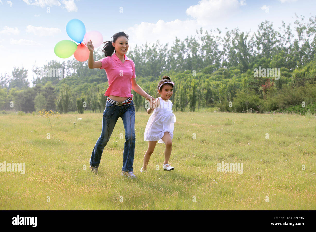 chinese family picnicing outdoors,beijing Stock Photo - Alamy