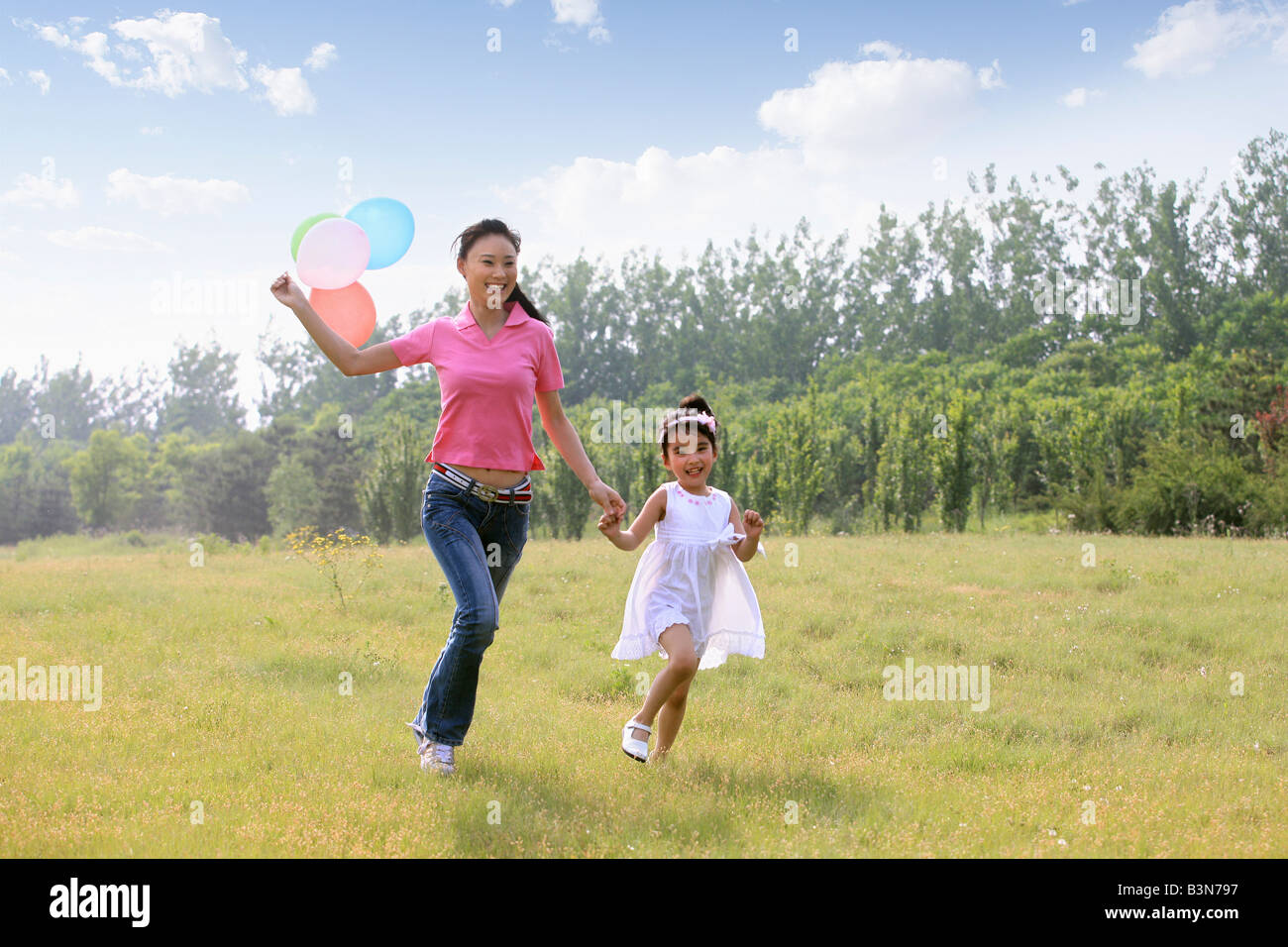 chinese family picnicing outdoors,beijing Stock Photo - Alamy
