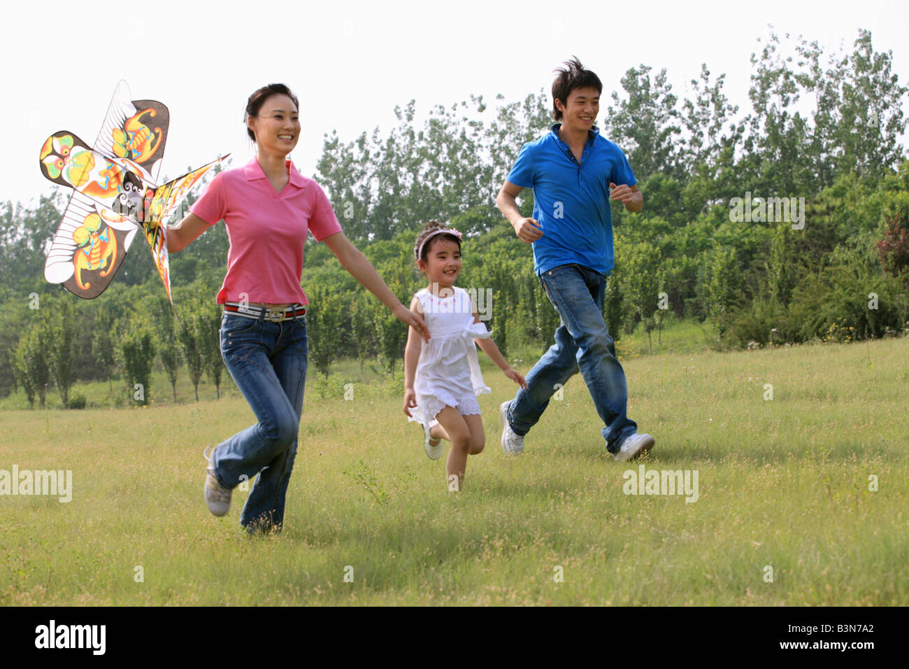 chinese family flying kite,beijing Stock Photo - Alamy