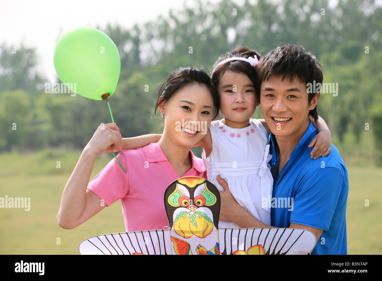 chinese family flying kite,beijing Stock Photo - Alamy