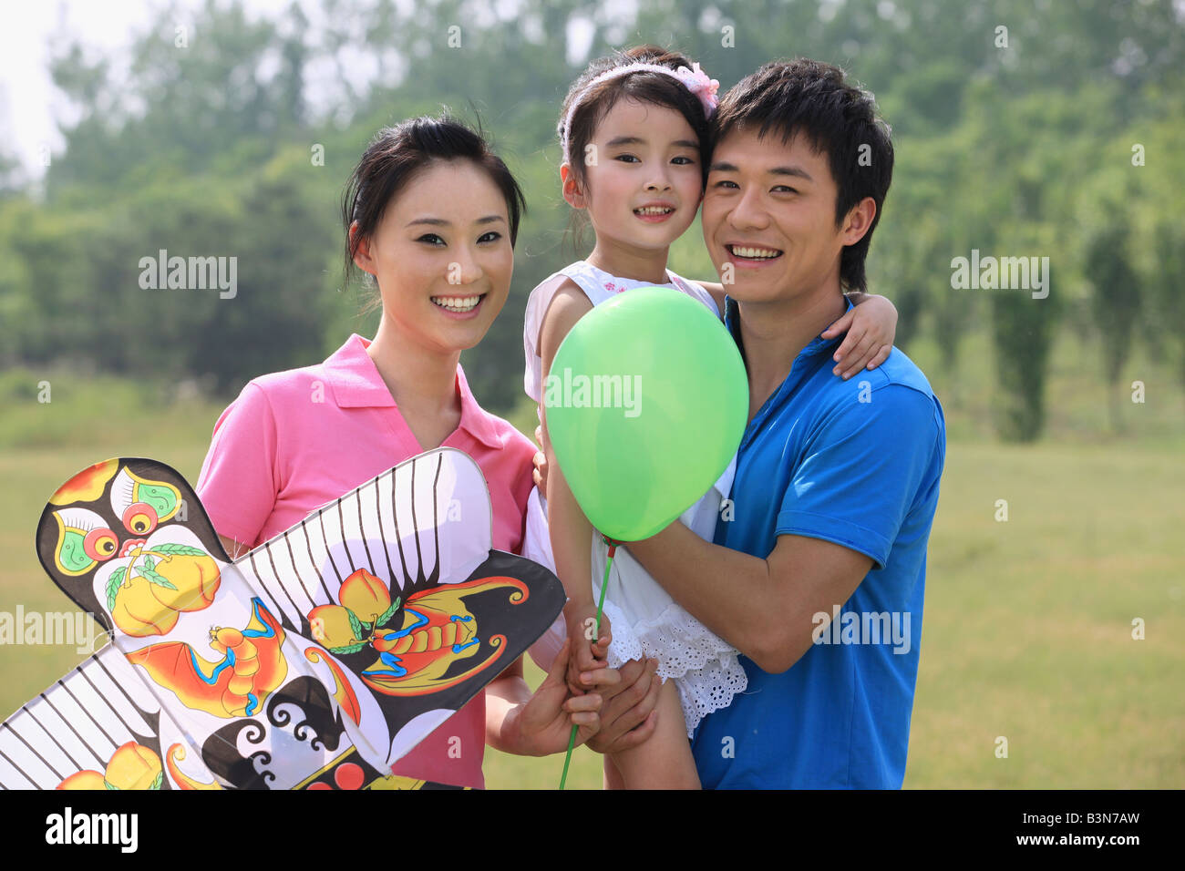 chinese family flying kite,beijing Stock Photo - Alamy