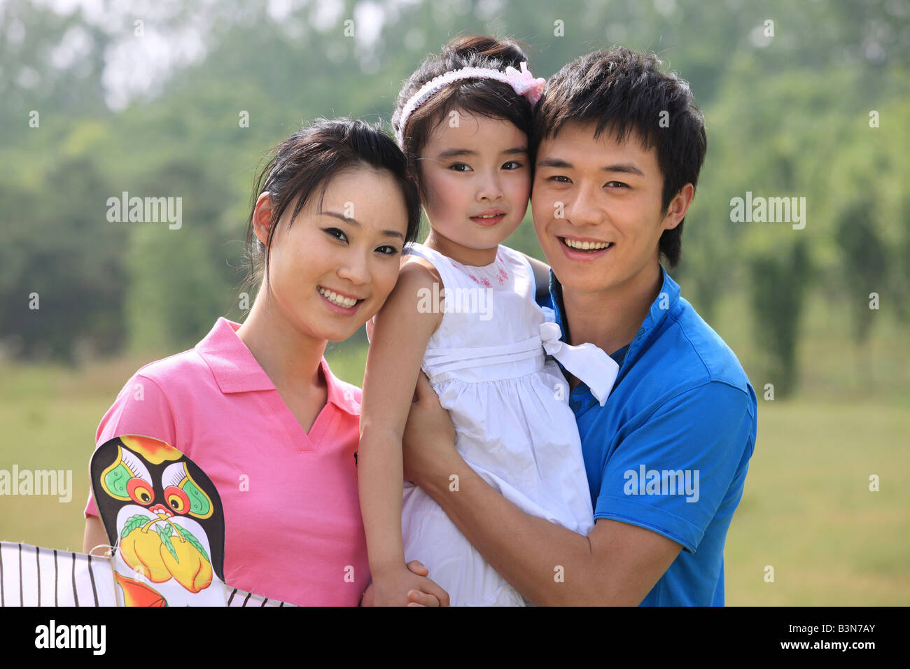 chinese family flying kite,beijing Stock Photo - Alamy