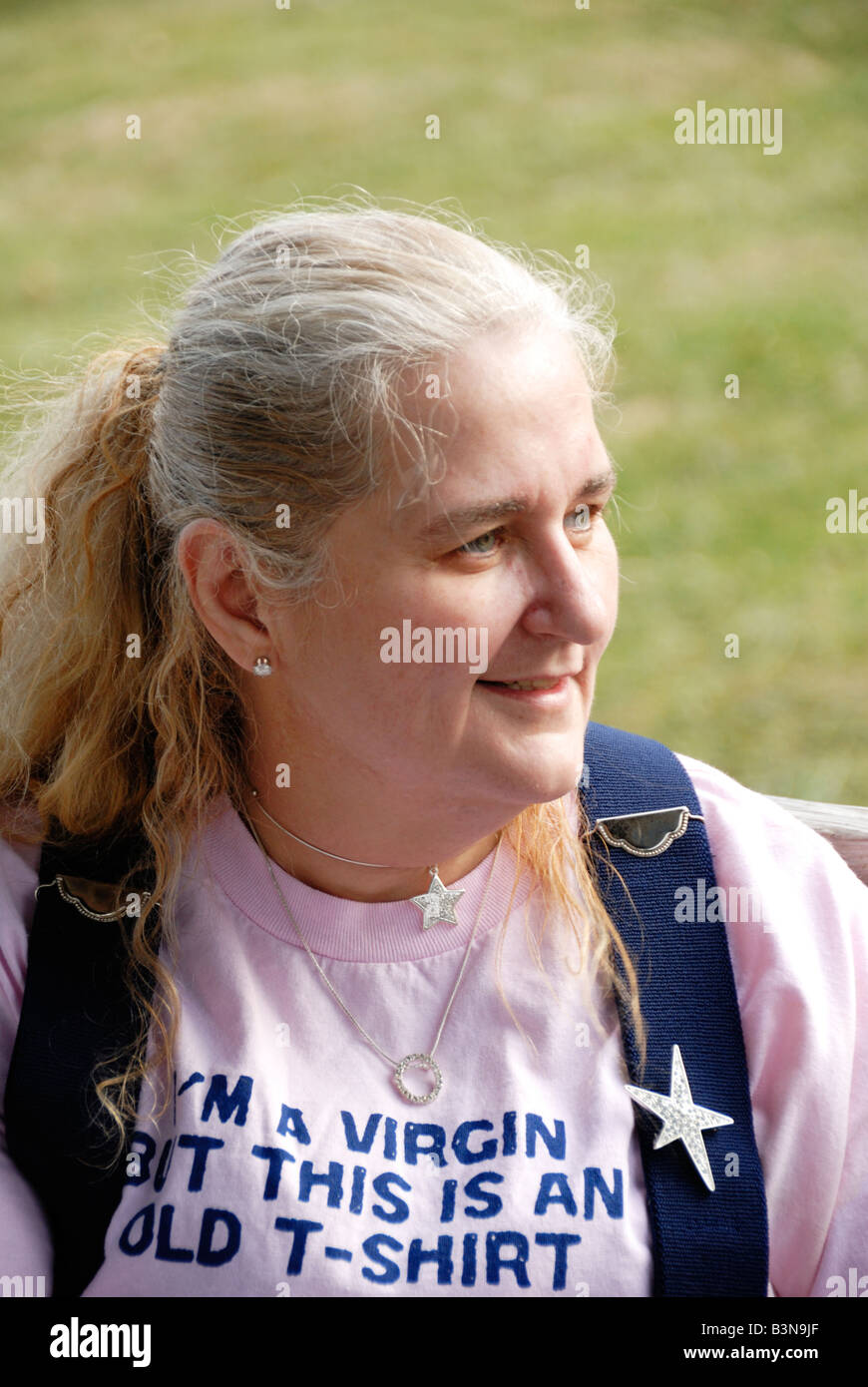 Woman sitting looking off into distance hi-res stock photography and ...