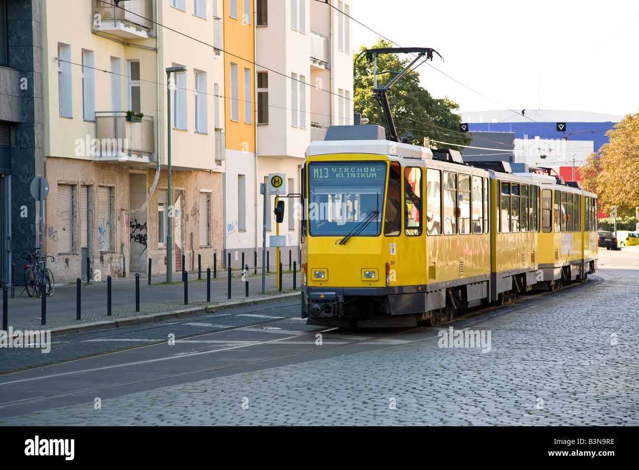 A yellow tram in Berlin Germany Stock Photo - Alamy