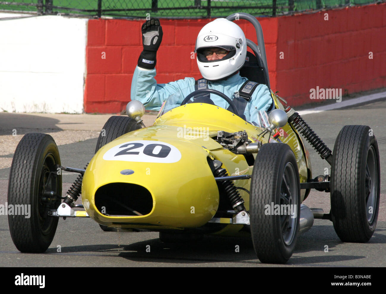 Geoff O’nion from Monaco in No. 20 a 1959 Yellow, Elva 100 Stock Photo ...