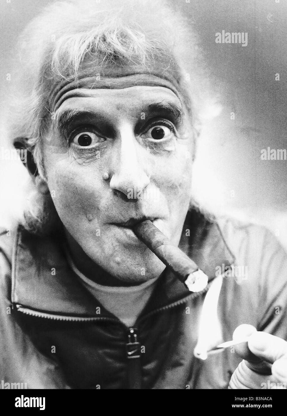 Jimmy saville smoking cigar hi-res stock photography and images - Alamy