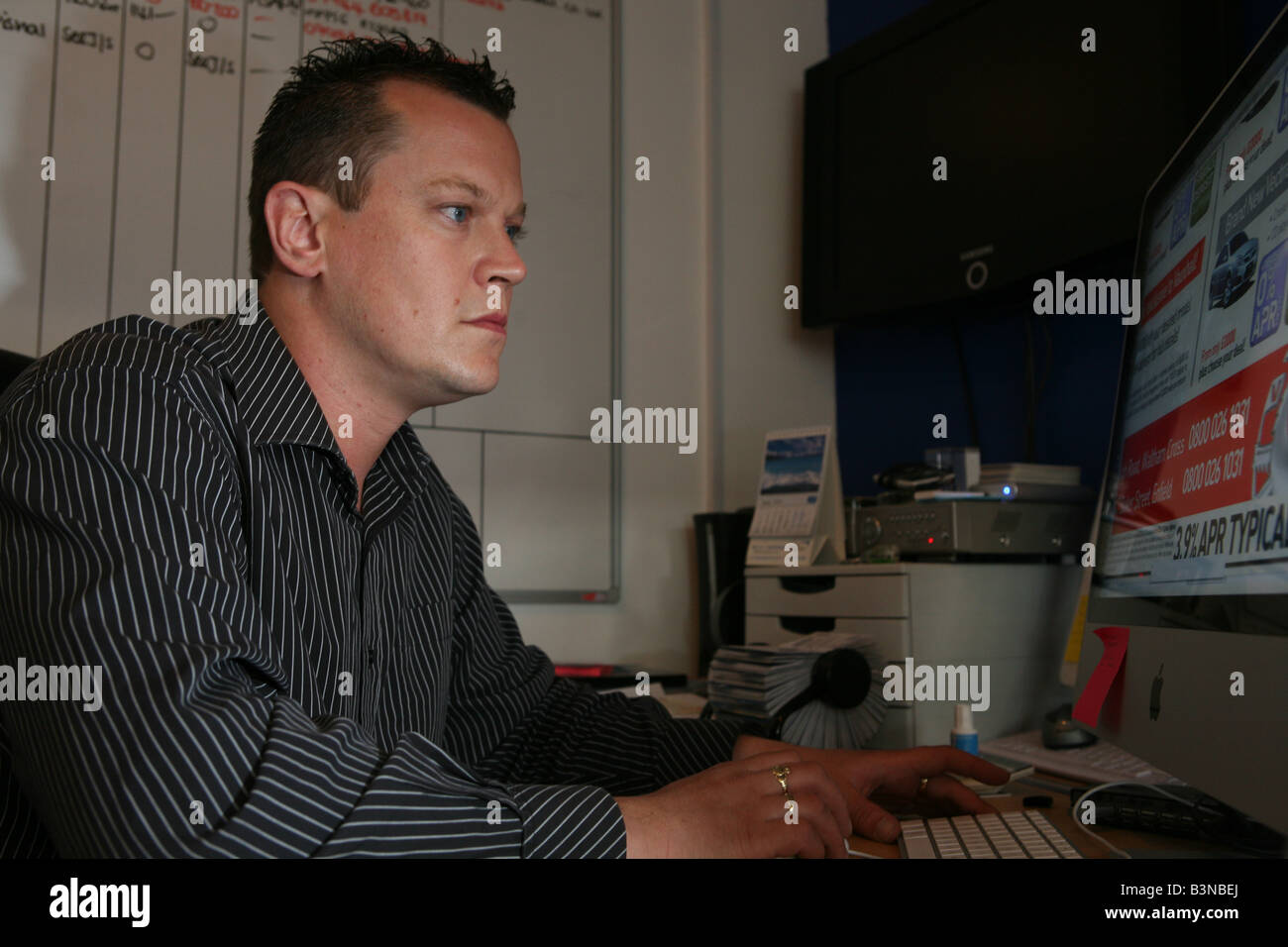 a business man working on a computer Stock Photo - Alamy