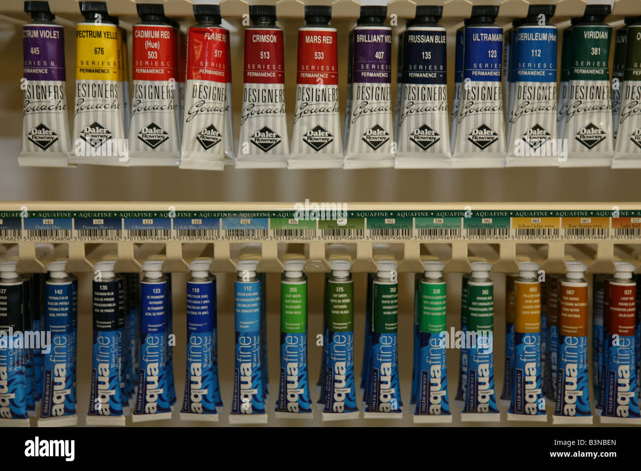 oil paints lined up on a shelf in a art shop Stock Photo - Alamy