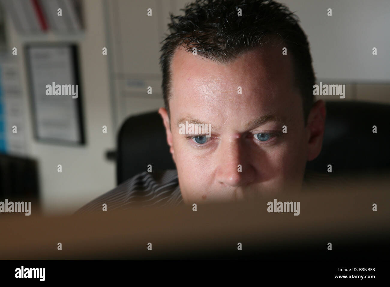 a portrait of a graphic designer working on a computer Stock Photo - Alamy