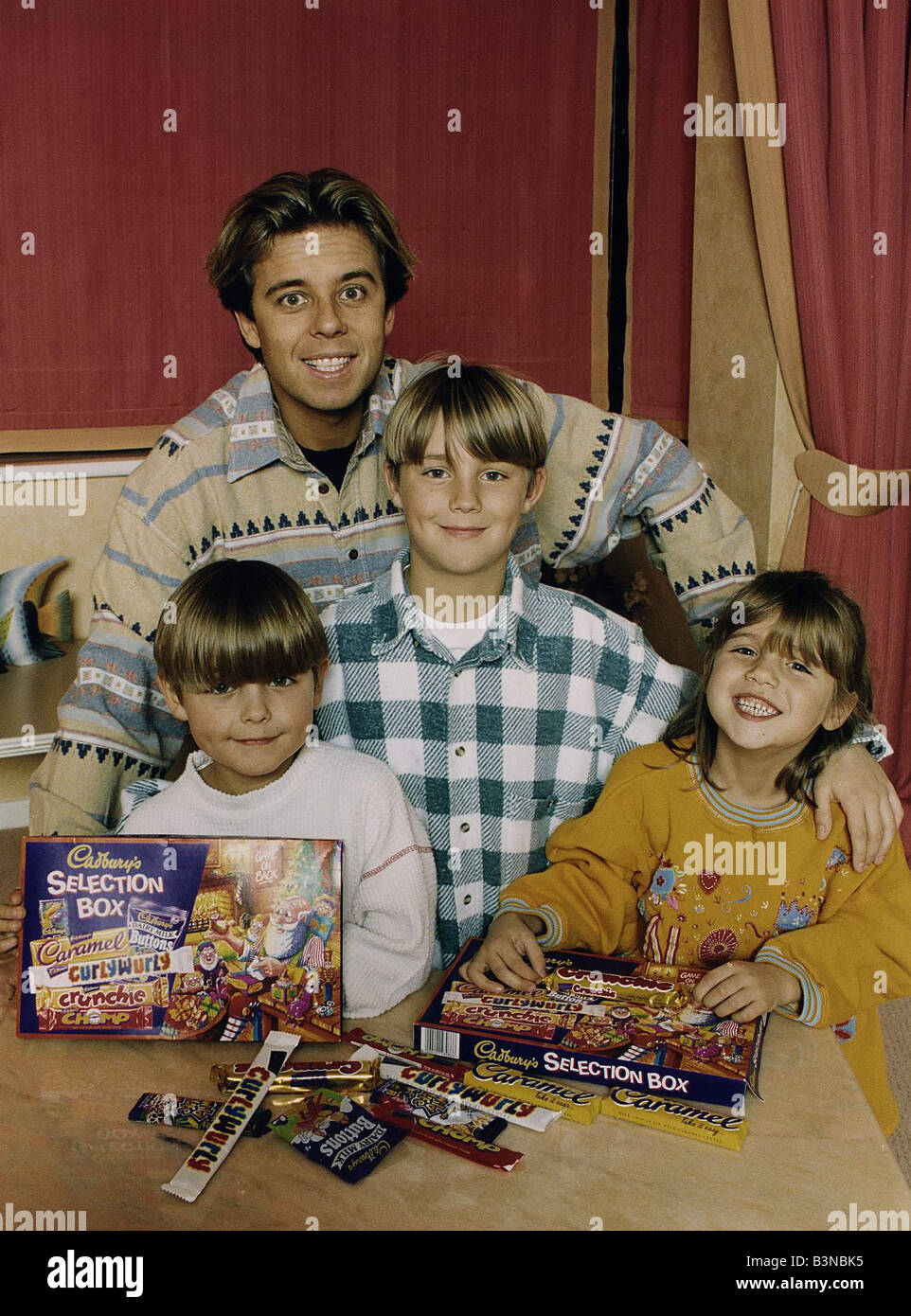 Pat Sharp childrens TV Presenter with children testing chocolate ...