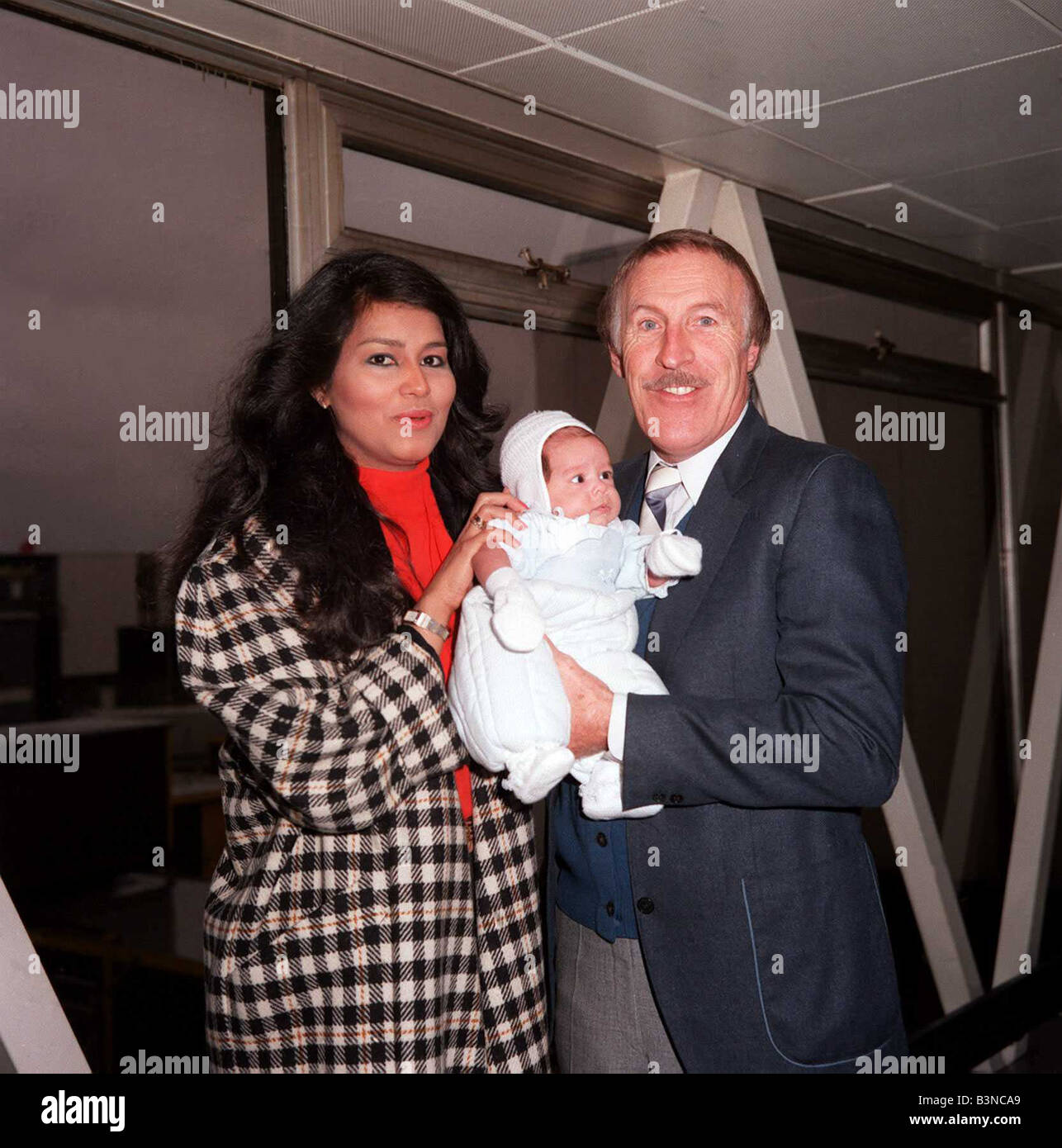 TV Presenter Bruce Forsyth December 1986 with his wife and new baby at ...
