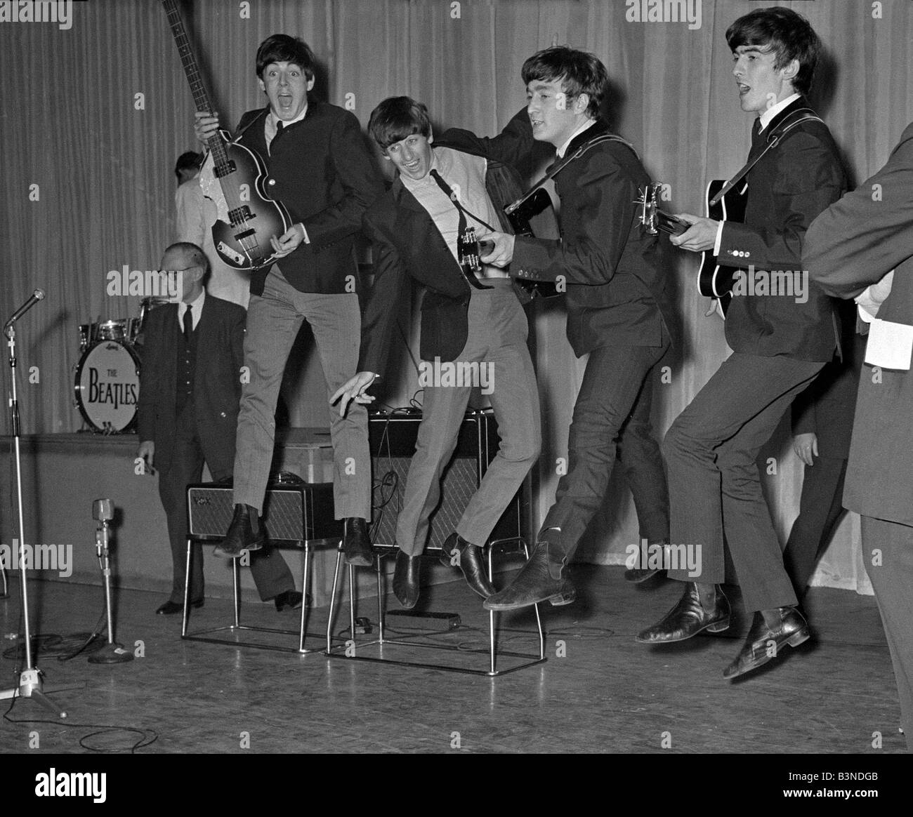 The Beatles play about and jump in the air during the rehearsals for ...