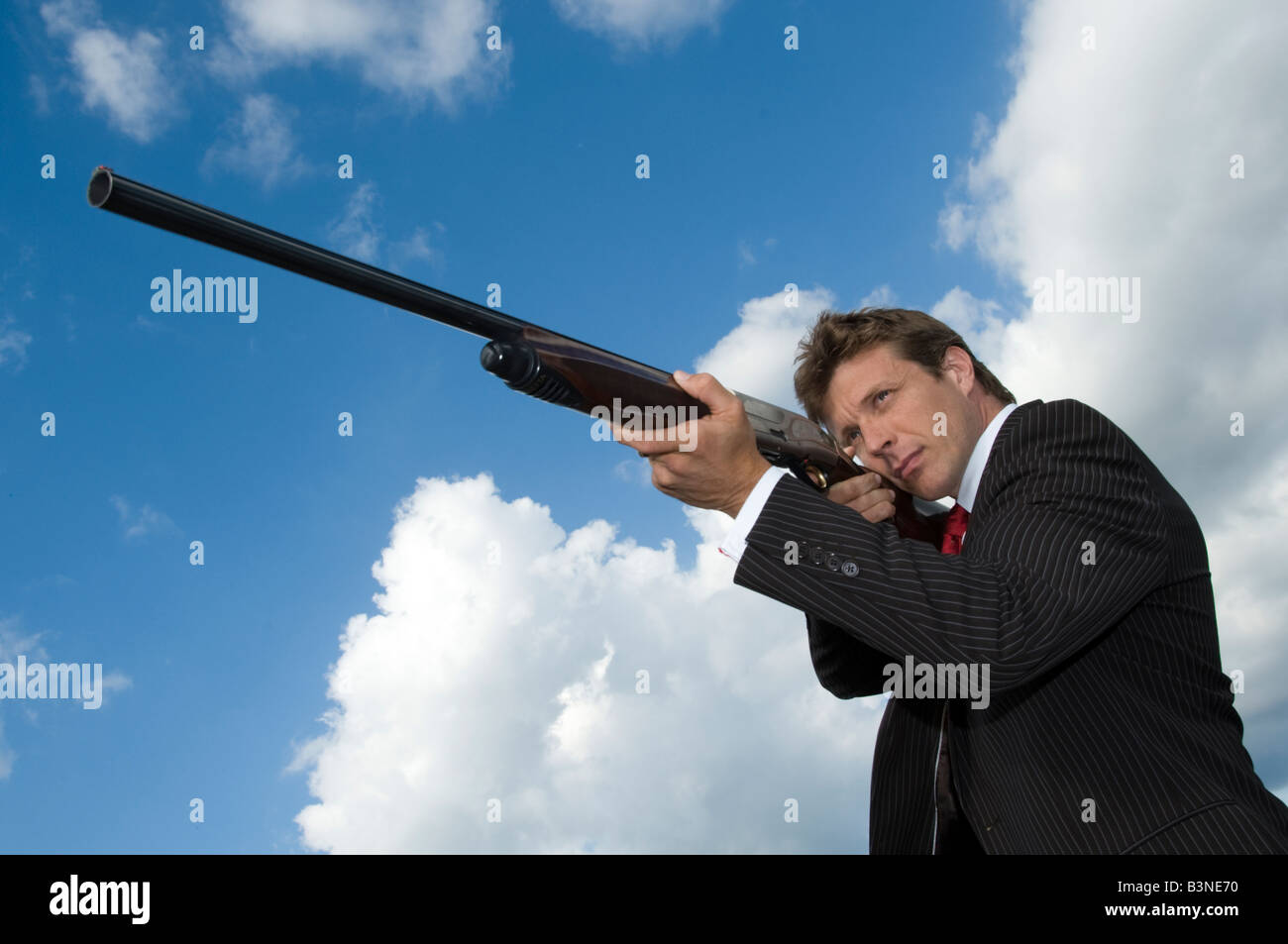 Business Man with golf club gun flags umbrella Model Released Shoot No ...