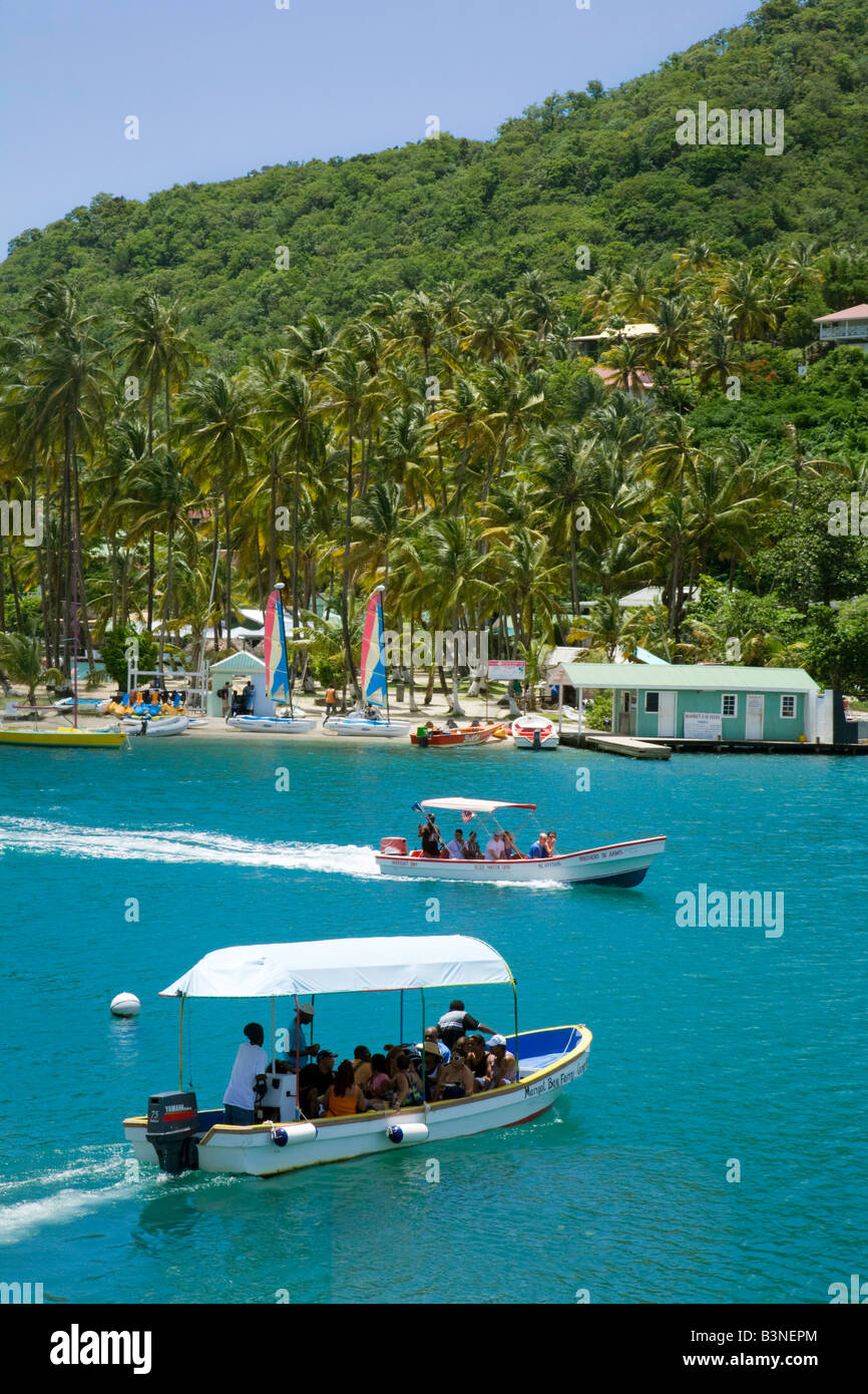 A ferry boat crosses to the beach, Marigot Bay, St Lucia, "West Indies ...