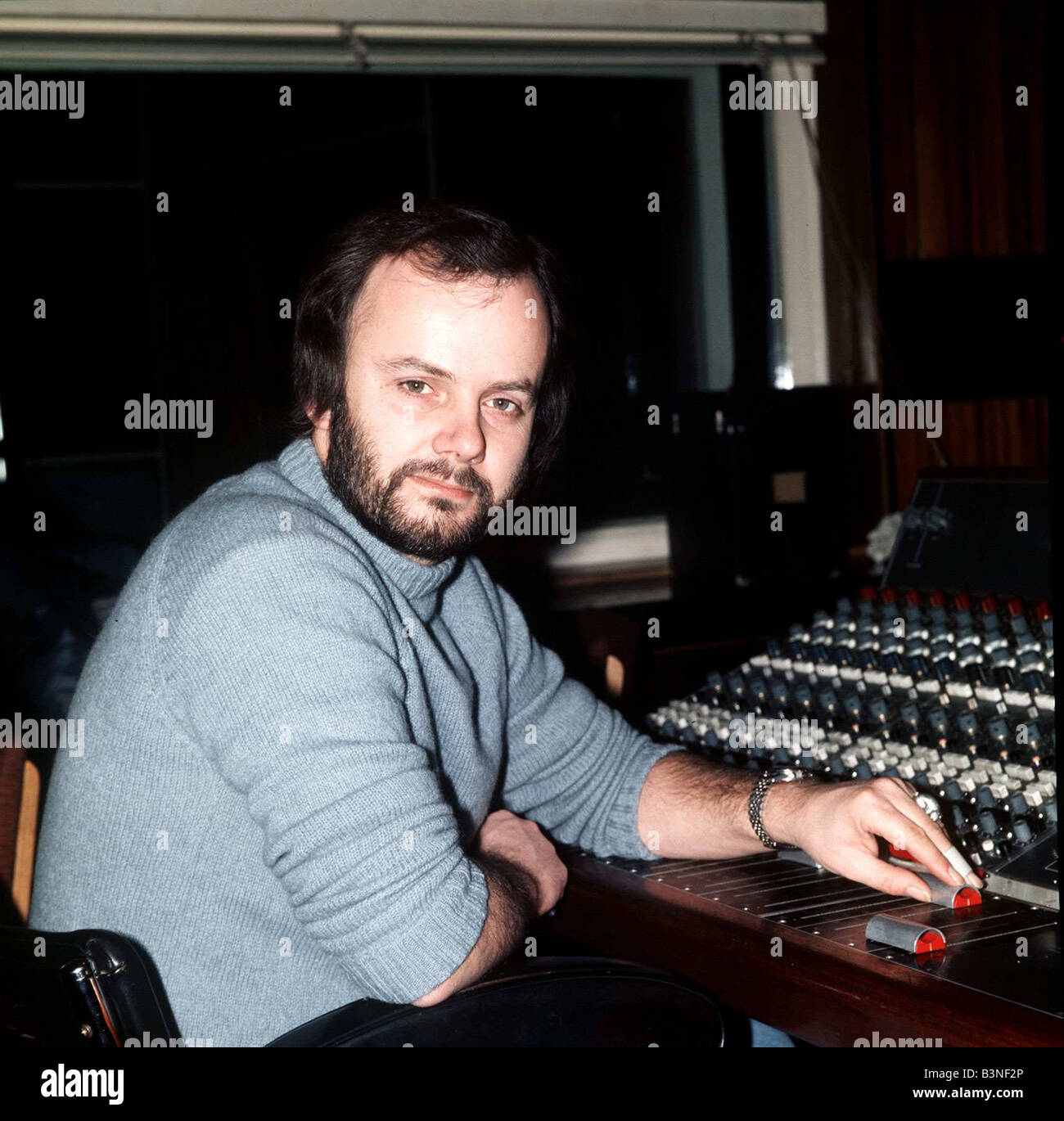 DJ John Peel in radio one studio sitting by mixing desk 1976 John Peel ...