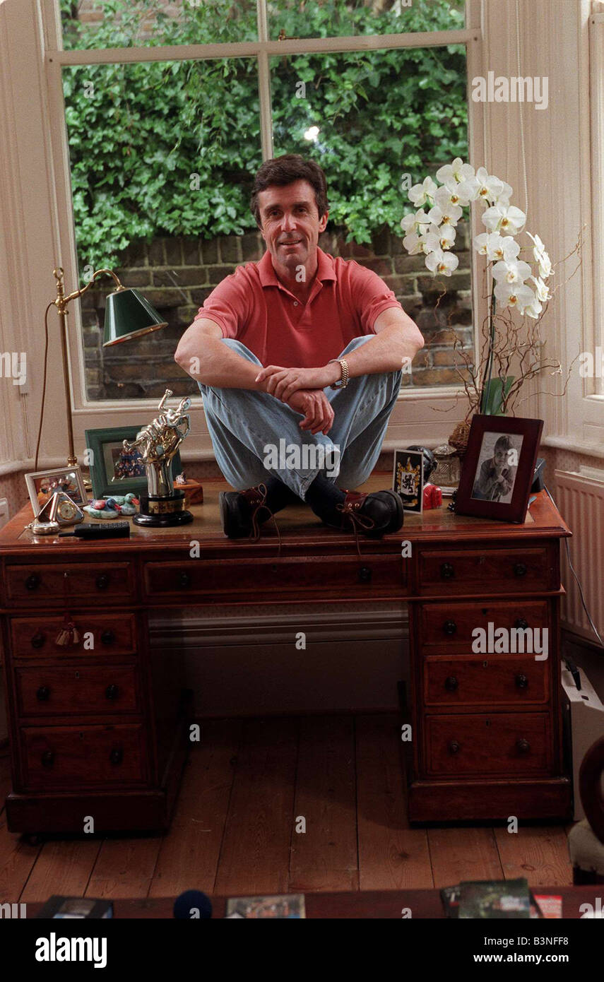 John Stapleton TV Presenter September 1998 At home sitting on his desk ...