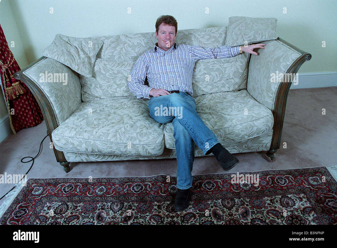 Jim Davidson Comedian TV Presenter November 1998 Sitting on sofa at ...