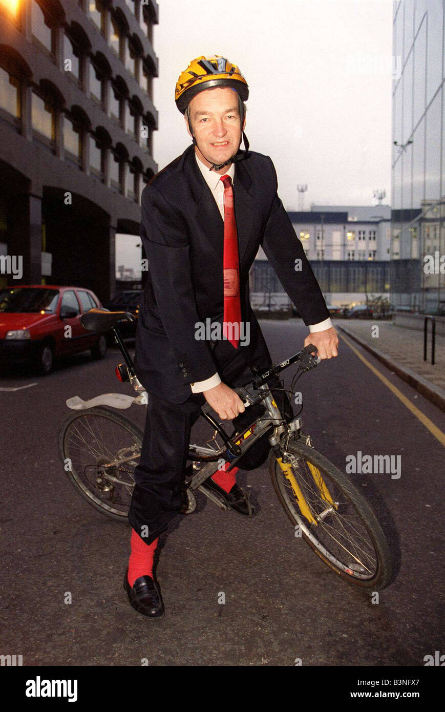 Jon Snow TV Presenter December 1998 Cahnnel 4 newscaster sitting on his ...