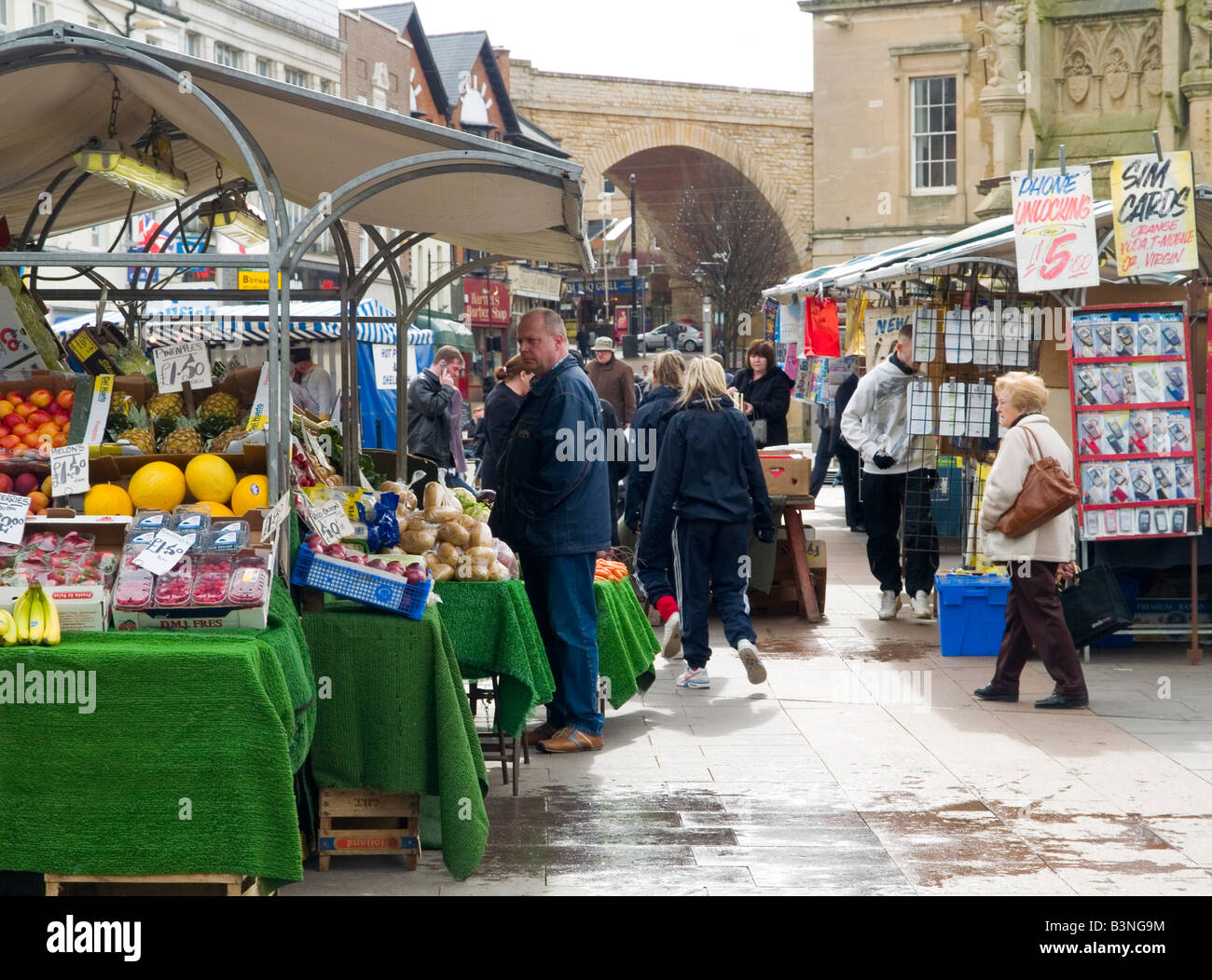 People shopping at the open air market in Mansfield Town Centre Market ...