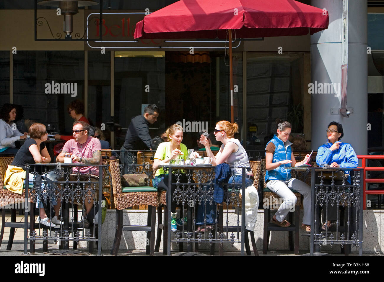 People dine at a sidewalk cafe in Vancouver British Columbia Canada ...