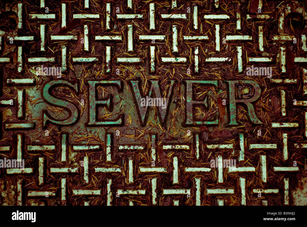 sewer cover sign Stock Photo - Alamy