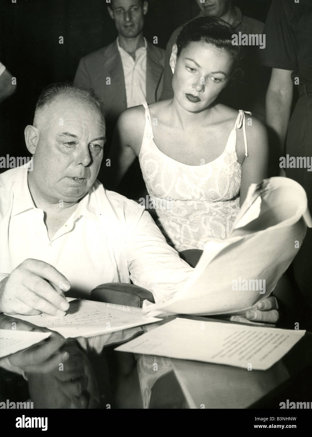 JEAN RENOIR French film director with US actress Gene Tierney at the ...