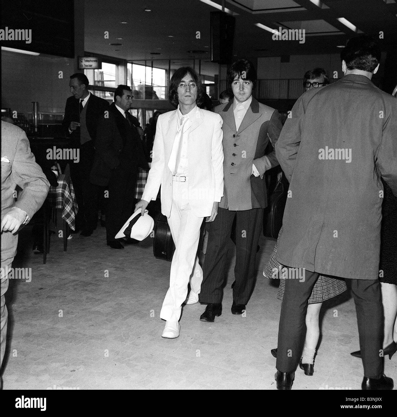 The Beatles 1968 John Lennon and Paul McCartney arriving at Heathrow ...