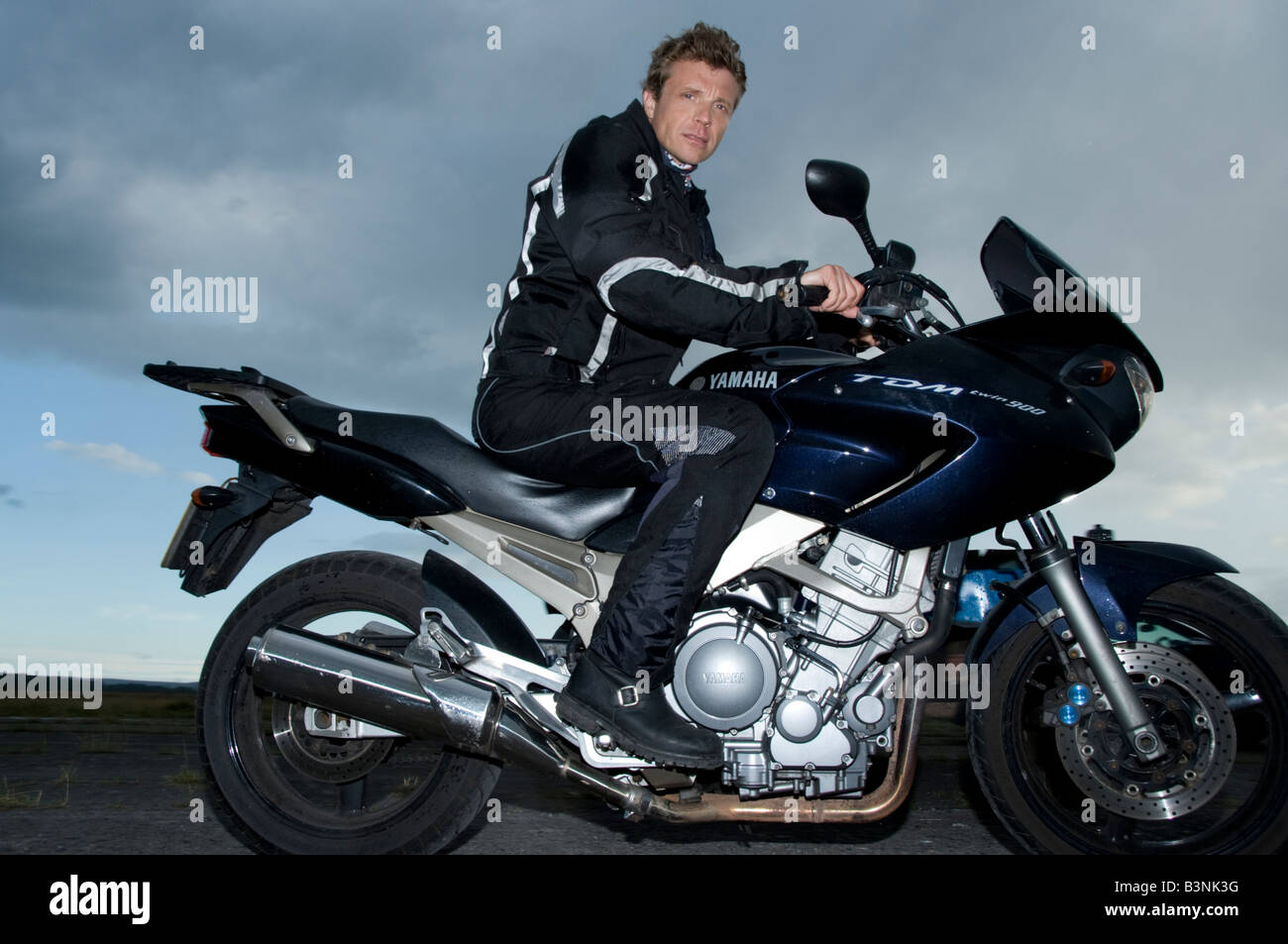 Man motorbike motorcycle Model released Stock Photo - Alamy