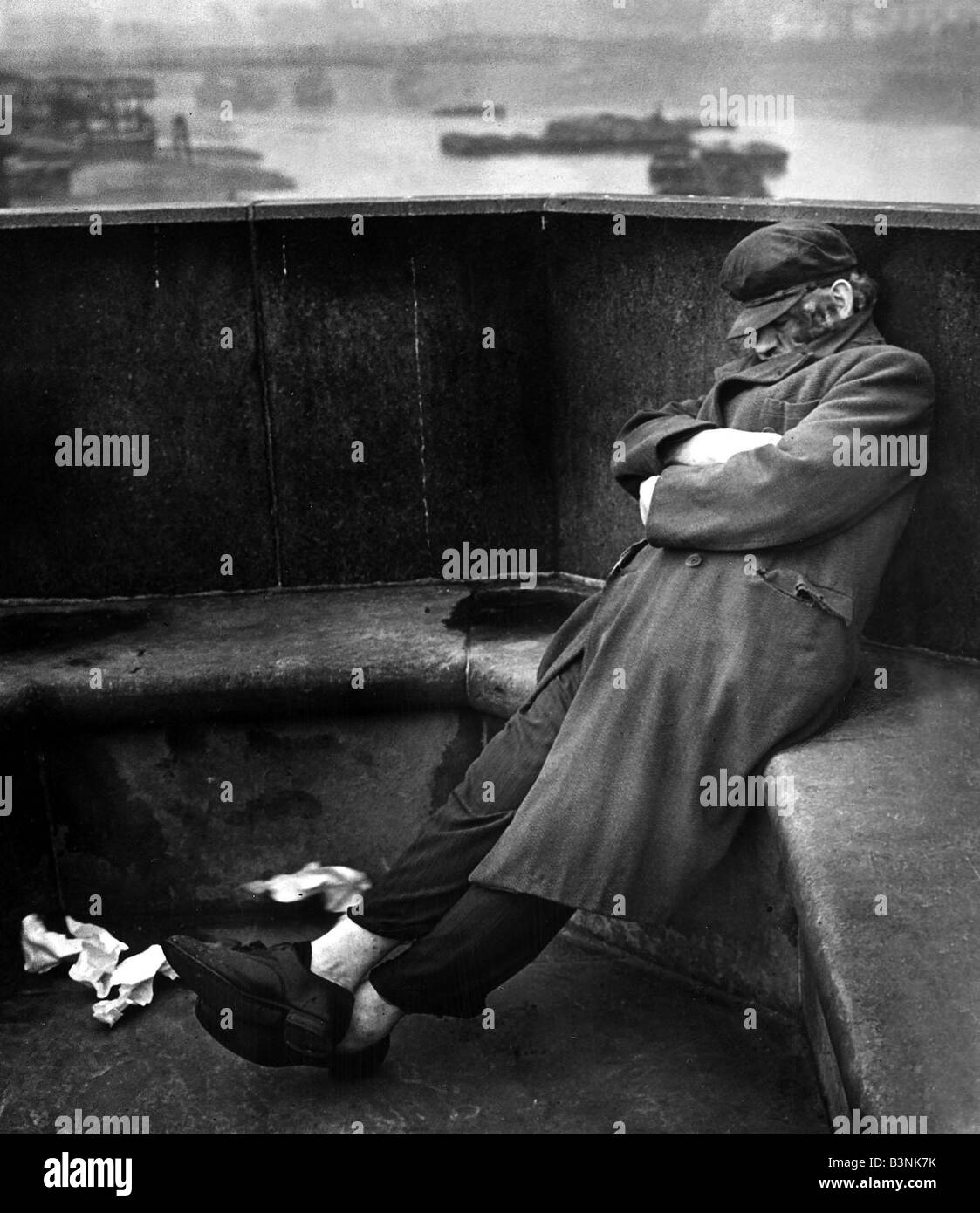 Homeless tramp sleeping rough on Blackfriars Bridge May 1943 Stock ...