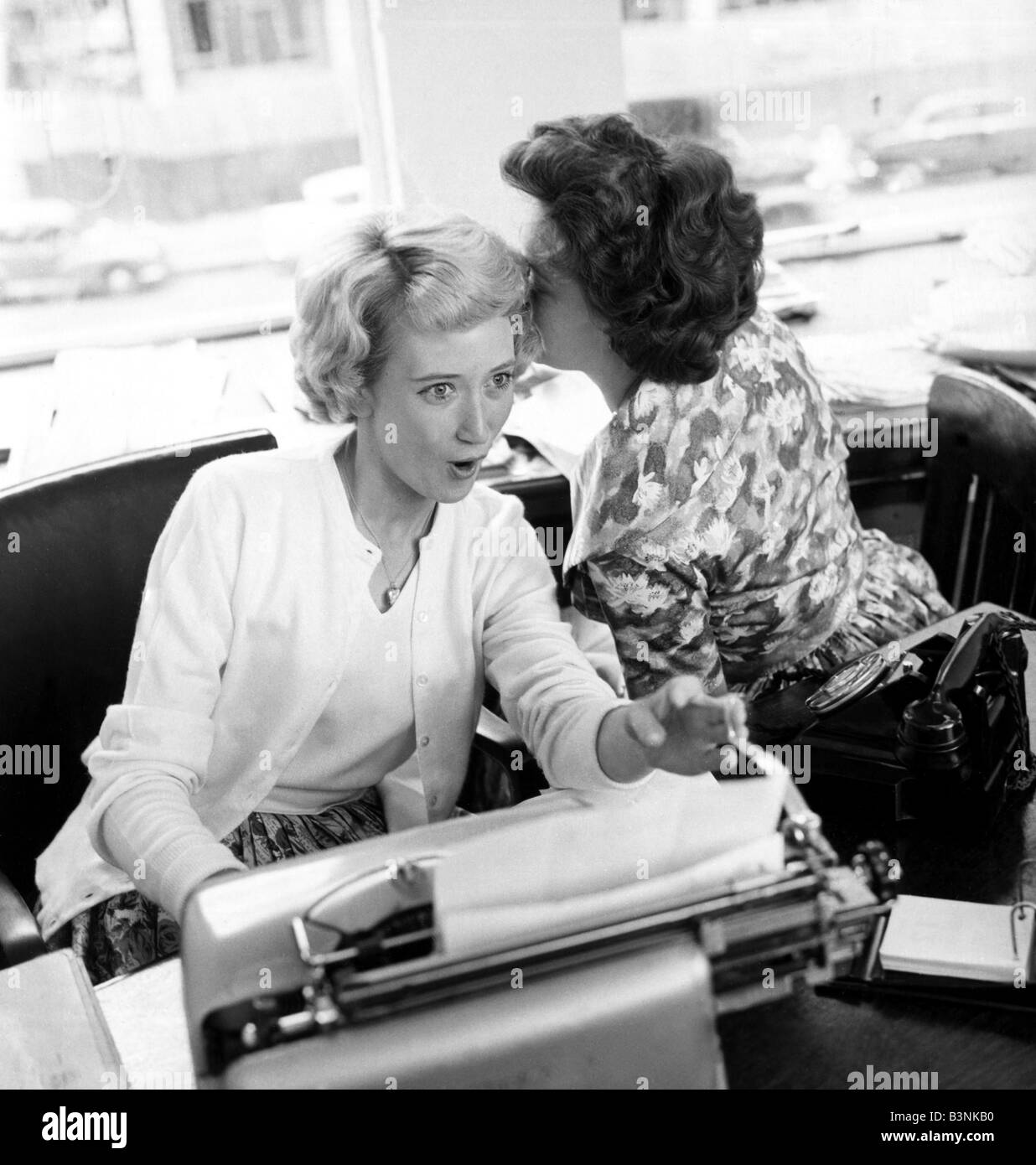 Girls gossiping in the office September 1960 Secretary typist office ...