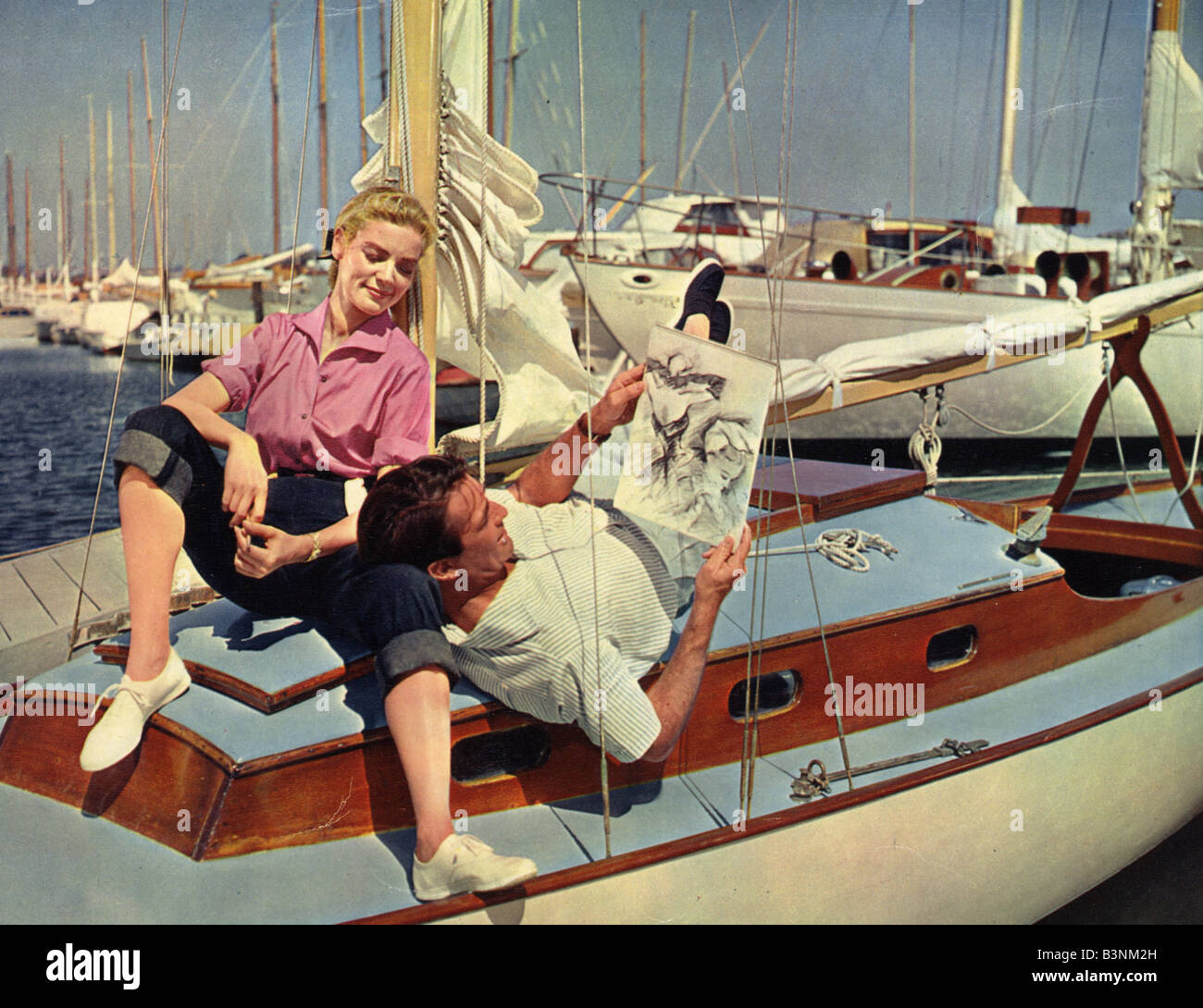 DESIGNING WOMAN 1957 MGM film with Gregory Peck and Lauren Bacall Stock ...