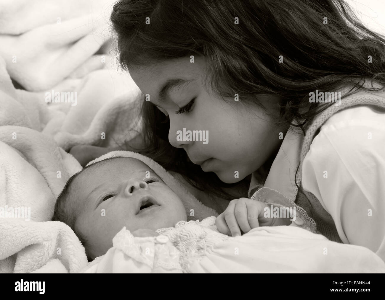 A newborn little girl Family love caring Stock Photo - Alamy