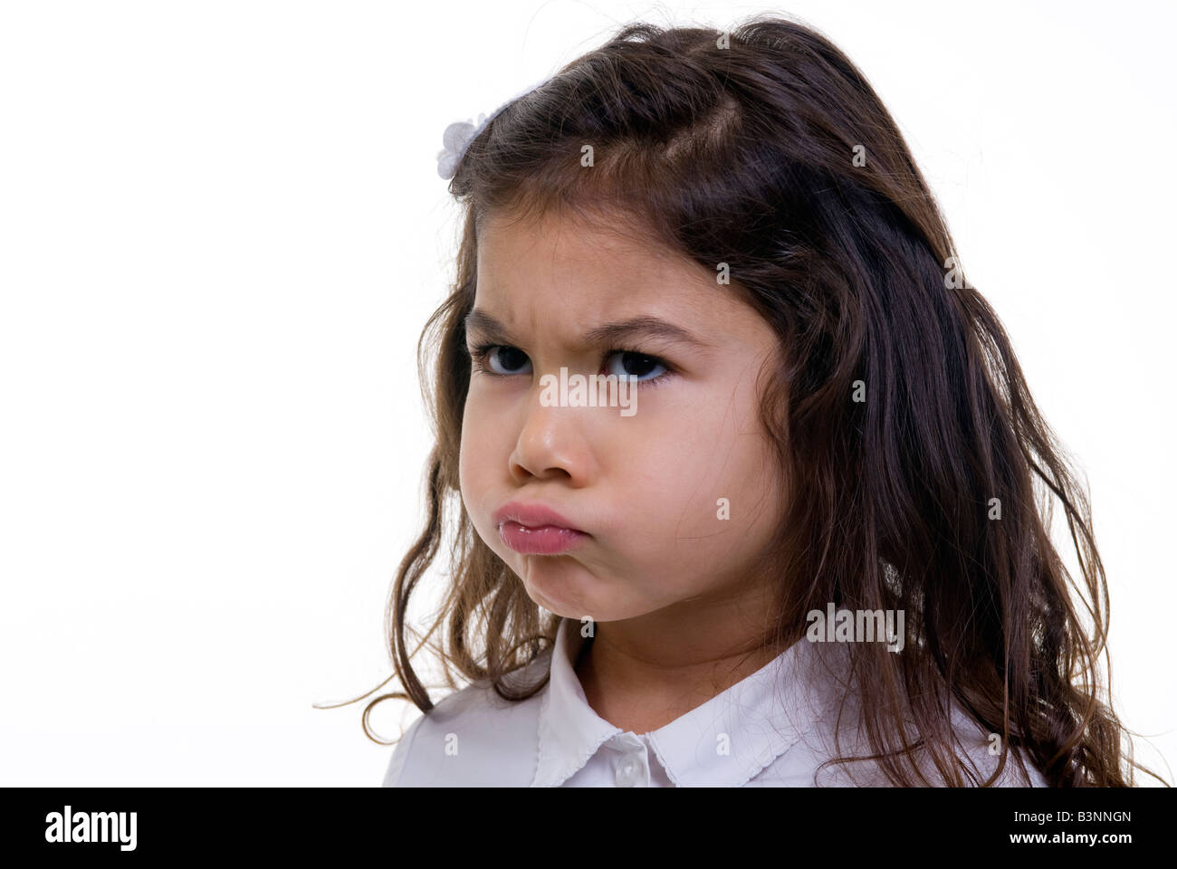A young girl is pouting about something Stock Photo - Alamy