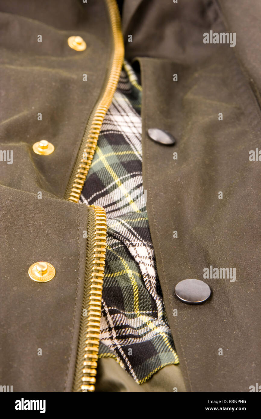 green fashion man rain jacket made of wax cotton Stock Photo - Alamy