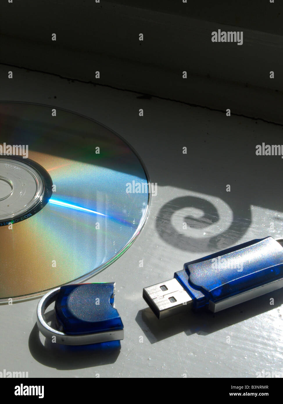 Memory stick with CD Stock Photo - Alamy