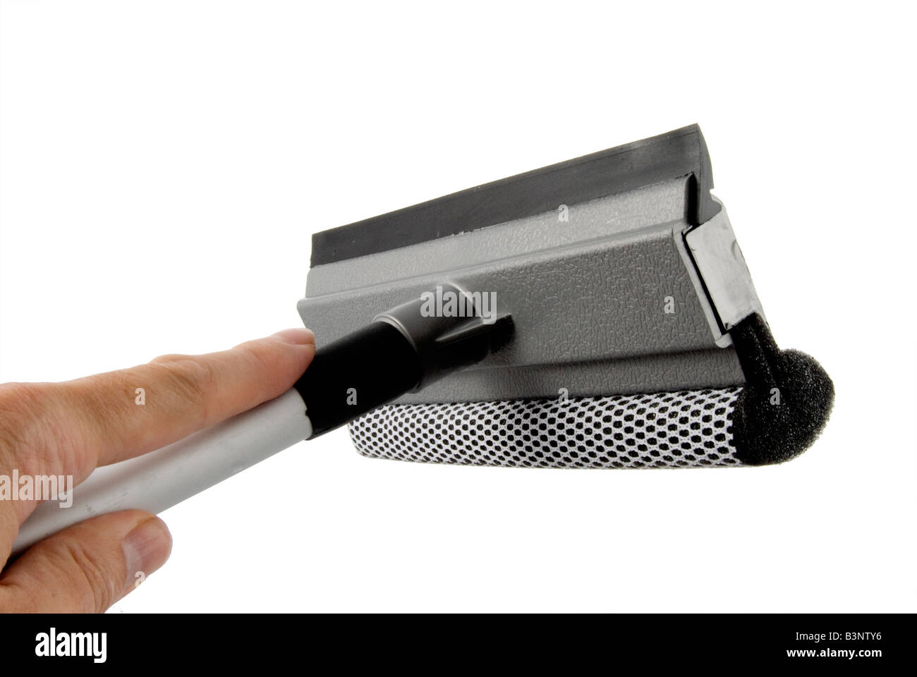 hand with window cleaning tool squeegee Stock Photo - Alamy