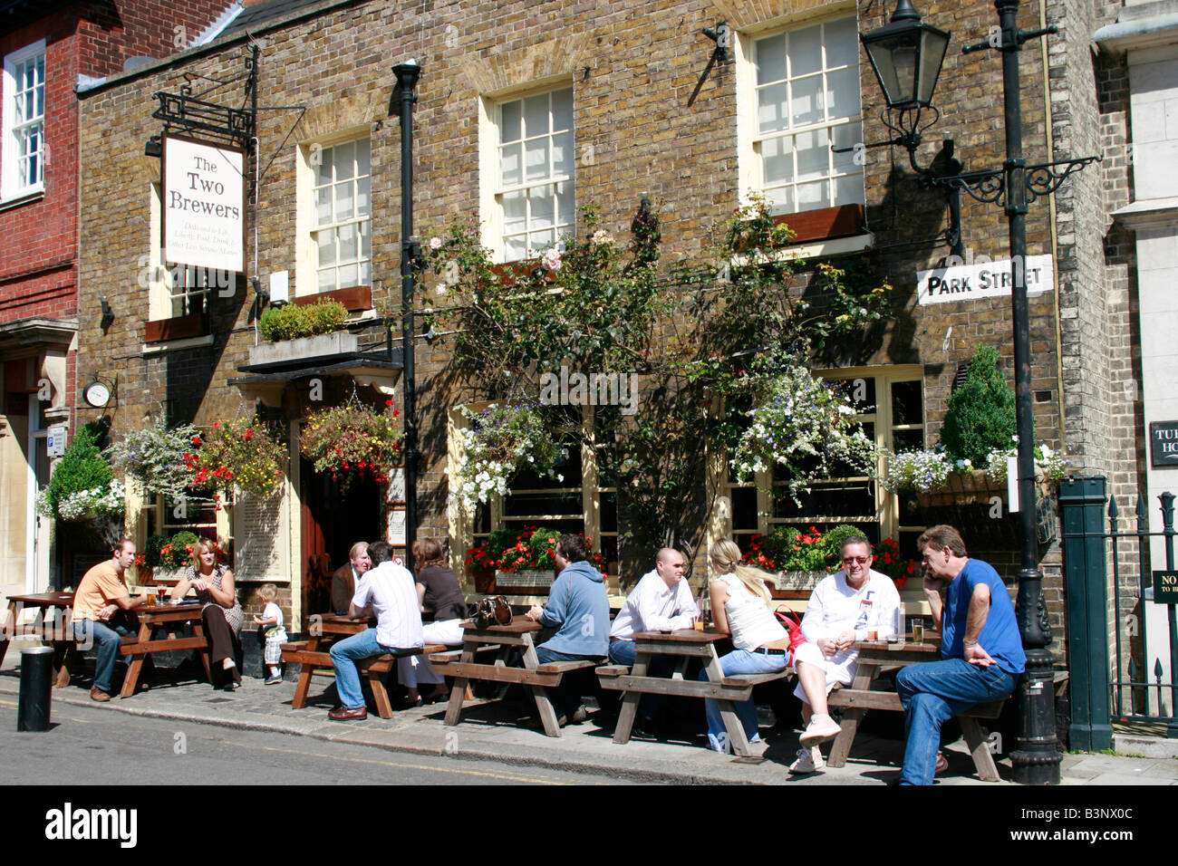 People enjoying a drink at the Two Brewers pub in Park Street Windsor ...