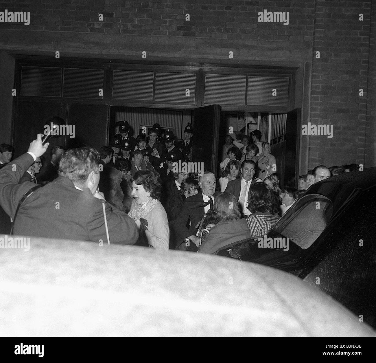 The Beatles arrive in Blackpool to chaotic scenes of screaming fans and ...