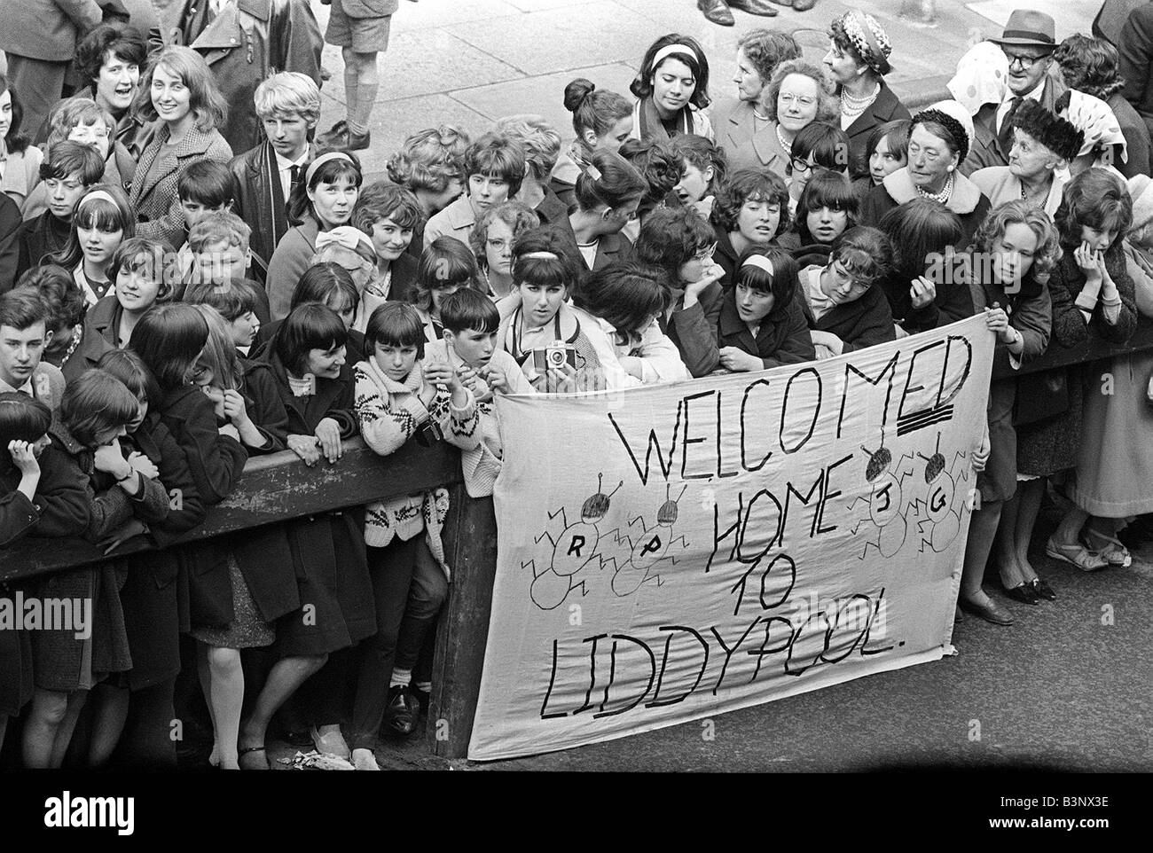 The Beatles July 1964 A banner reading Welcomed Home to Liddypool is ...