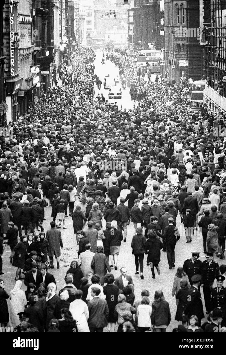 The Beatles July 1964 Crowds of fans fill the streets in Liverpool as ...