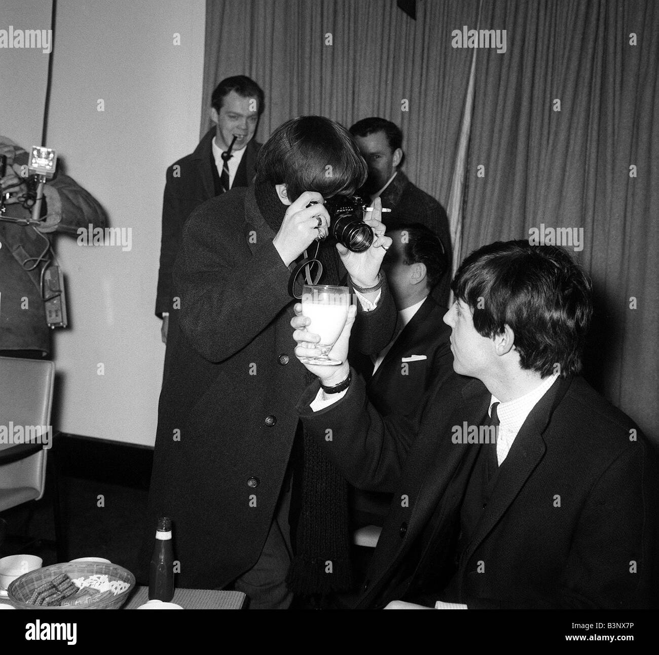 The Beatles February 1964 Ringo Starr taking pictures of Paul McCartney ...